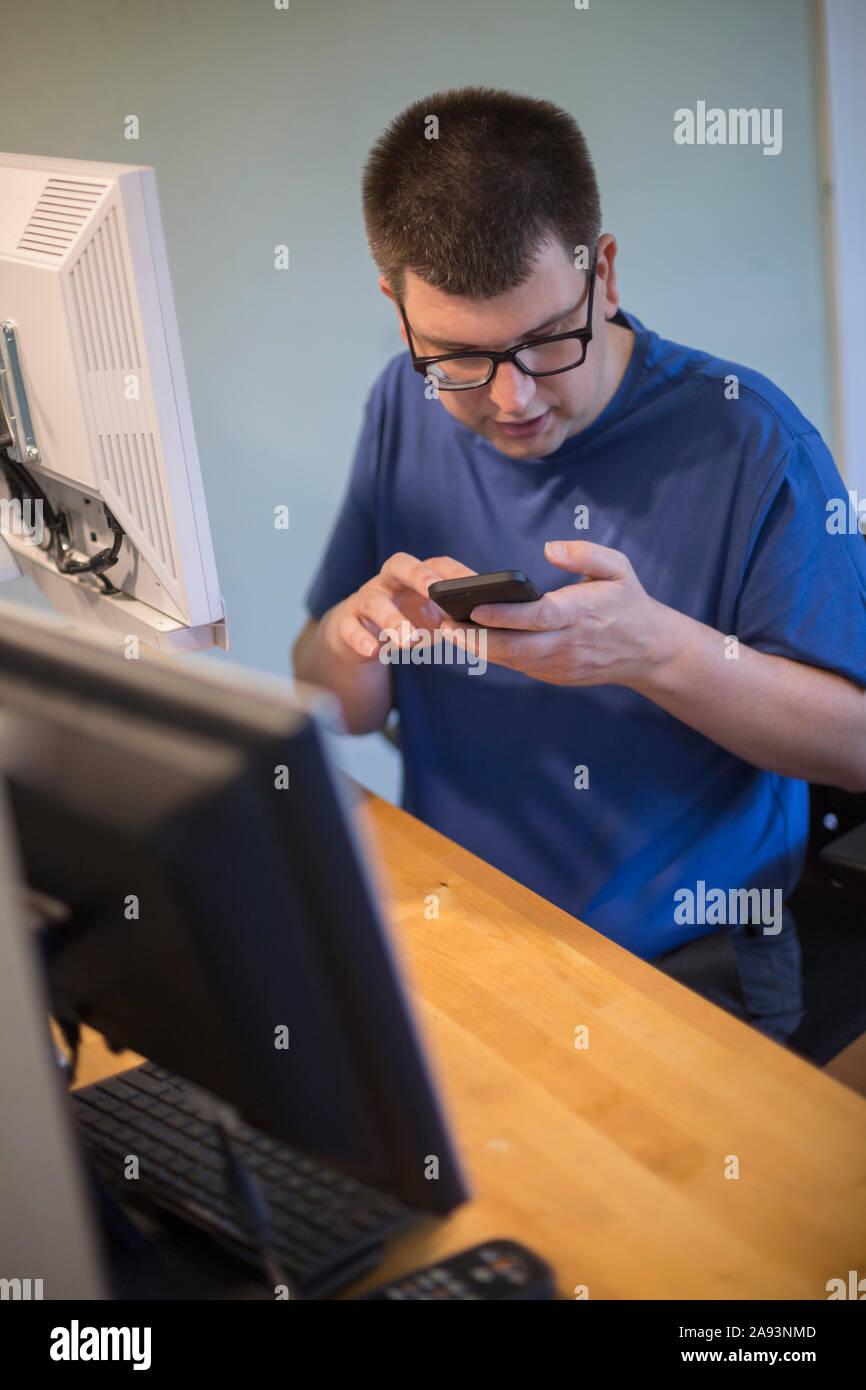 Man with Visual Impairment using his technology to communicate Stock ...