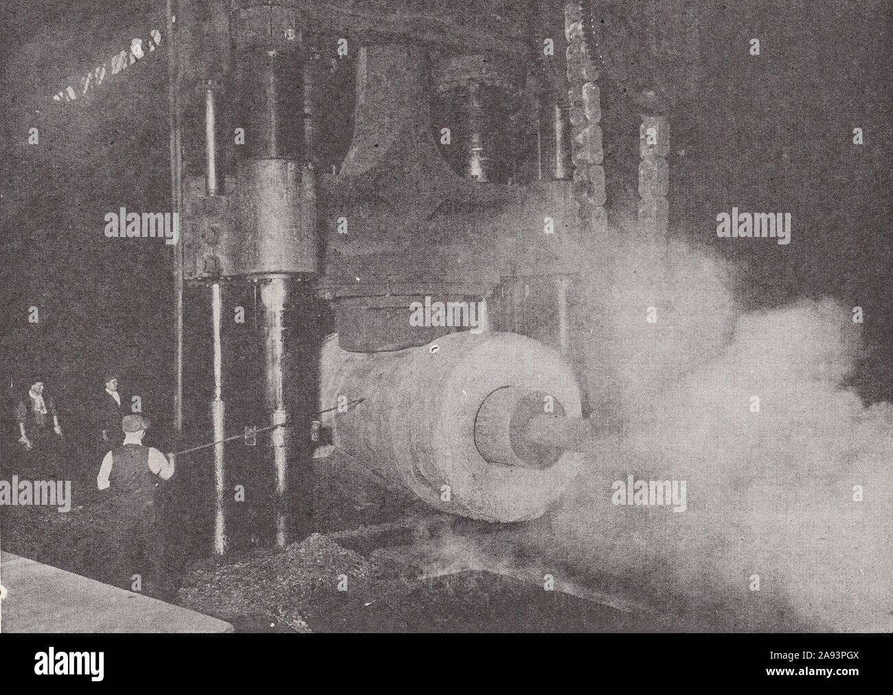 4000-tons hydraulic press at work on a 91-ton ingot 1930s Stock Photo ...