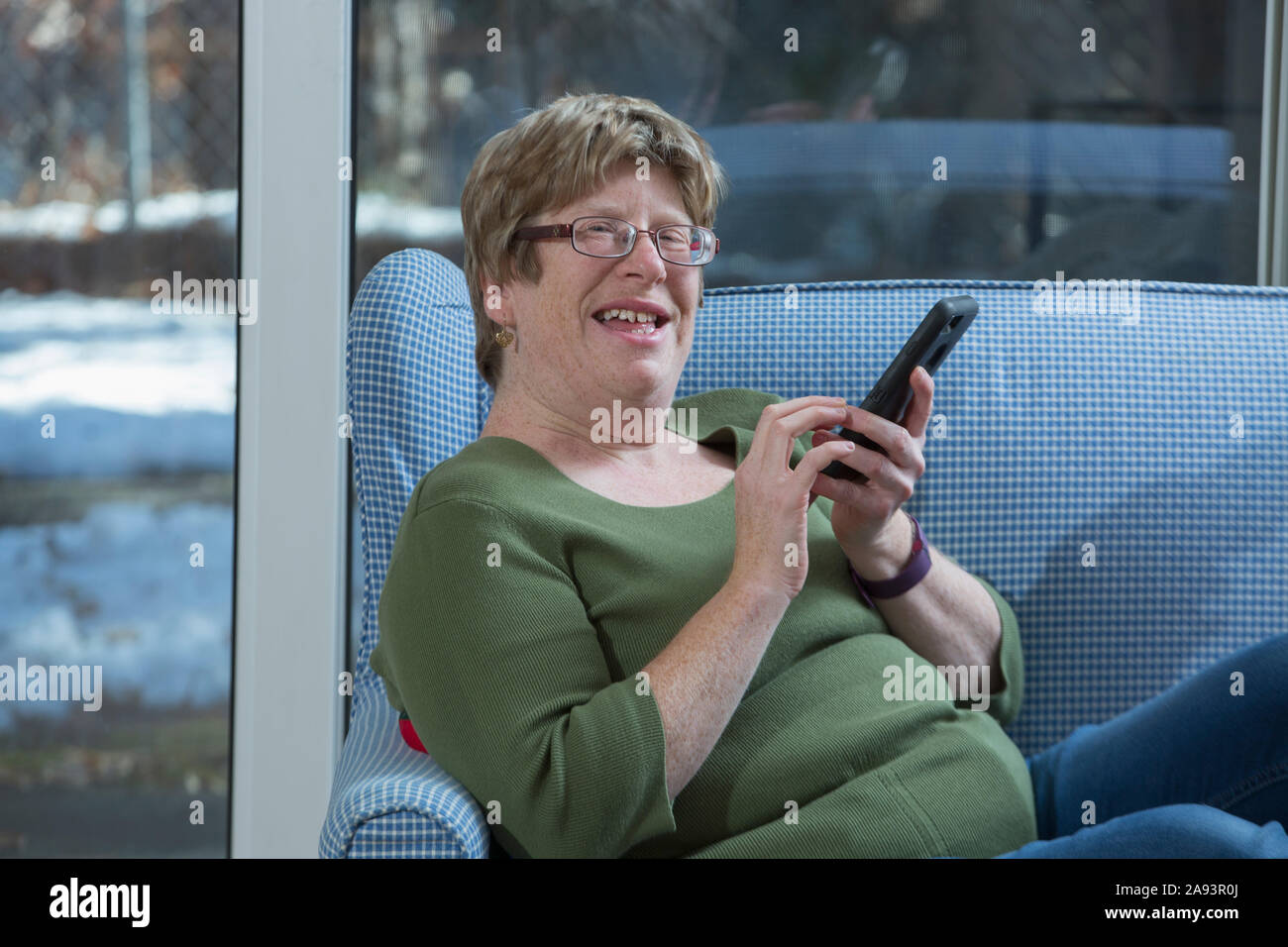 Woman autism using smartphone hi-res stock photography and images - Alamy