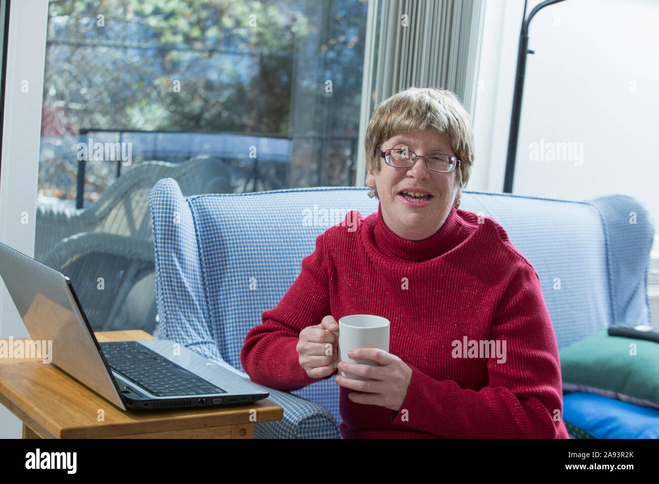Woman with Autism drinking coffee Stock Photo - Alamy