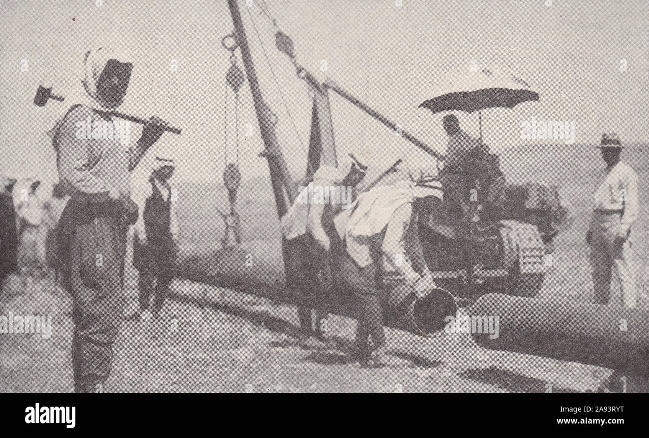 1930s working on oil pipeline hi-res stock photography and images - Alamy