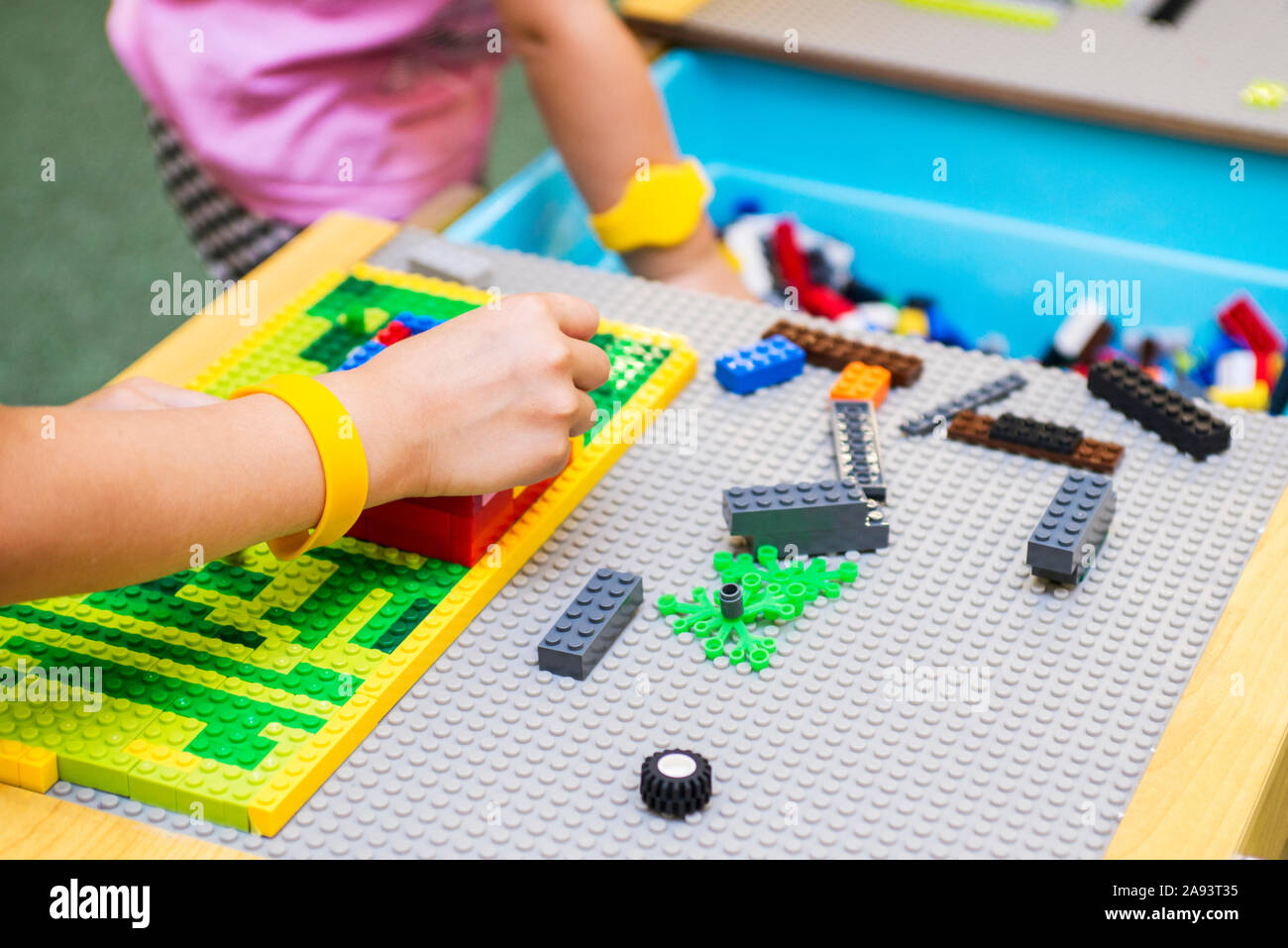 The child collects the designer. Kids activity in kindergarten or at ...