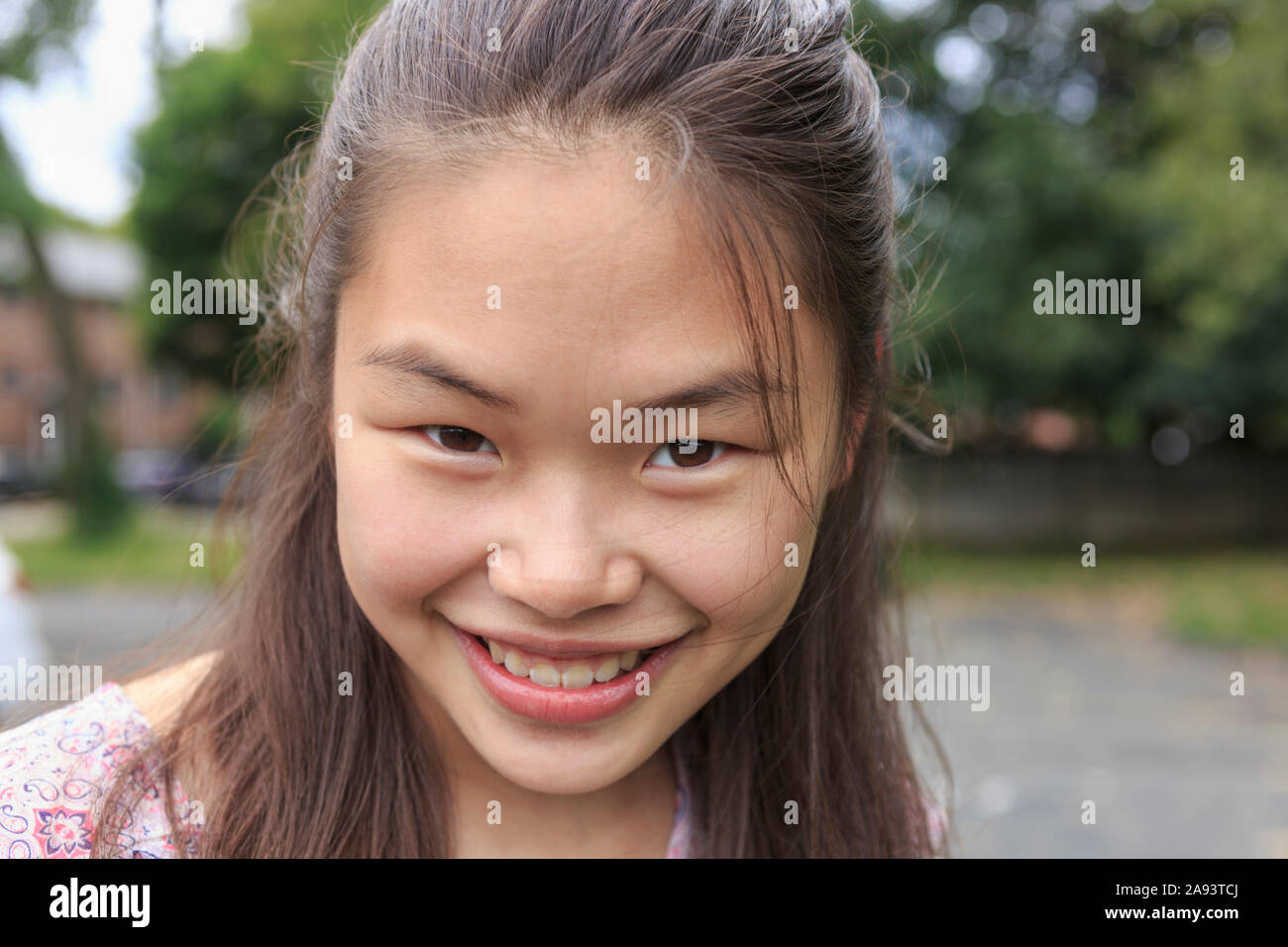 Portrait of a happy teen girl with Learning Disability Stock Photo - Alamy