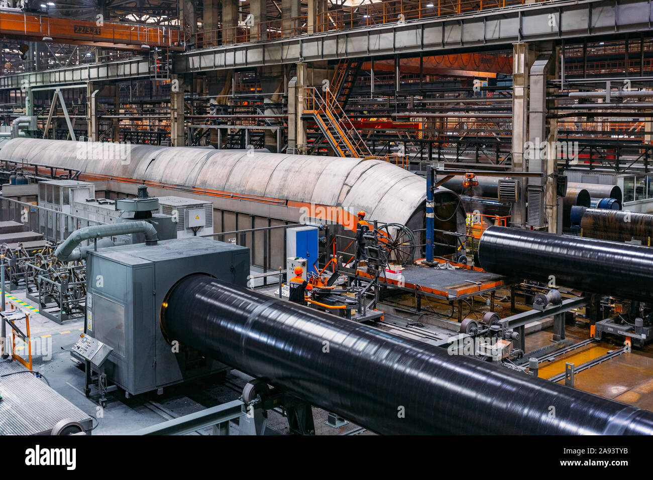 Polymer layer anti corrosion pipe coating machinery Stock Photo - Alamy