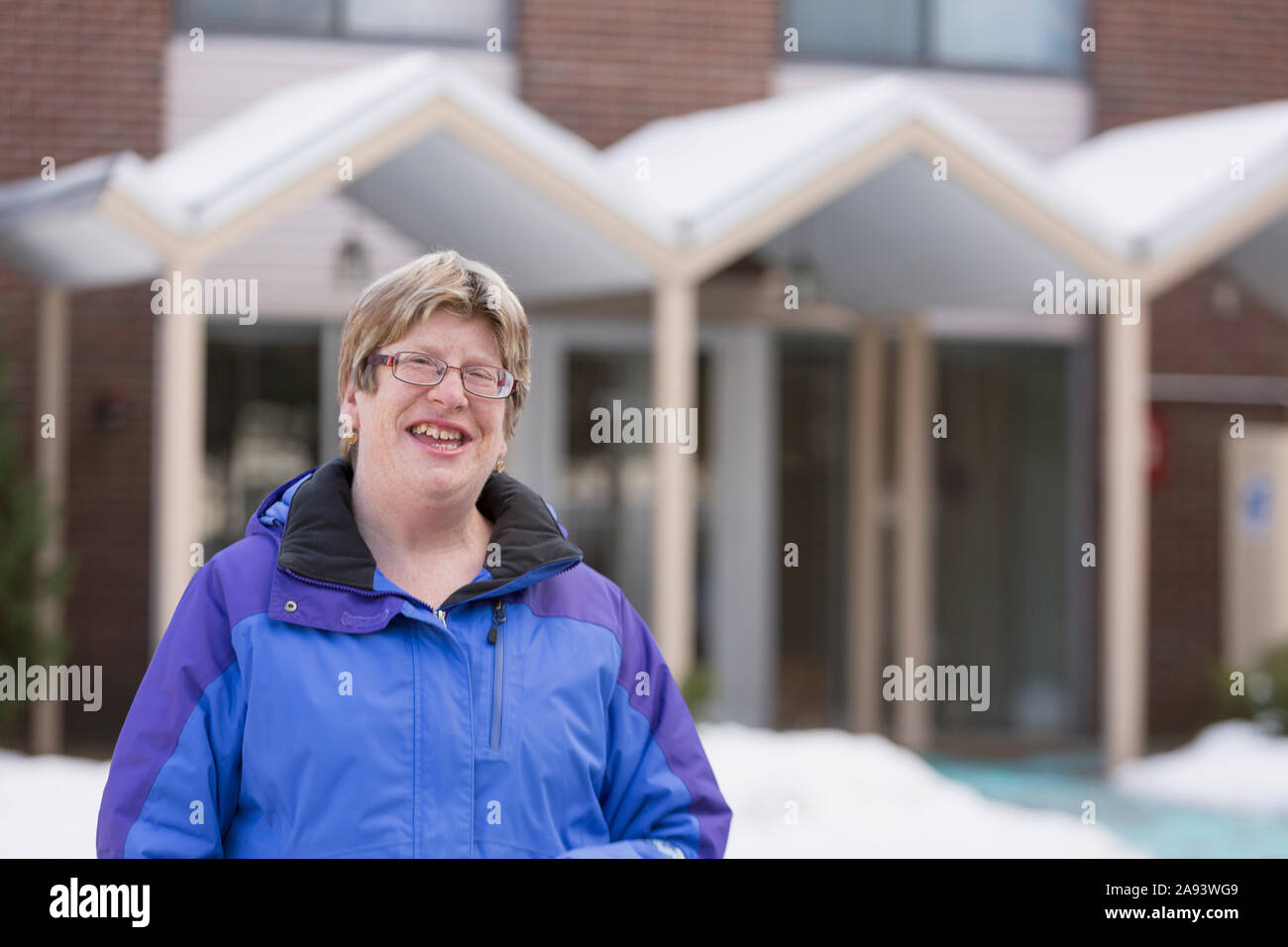 Woman with Autism smiling Stock Photo - Alamy