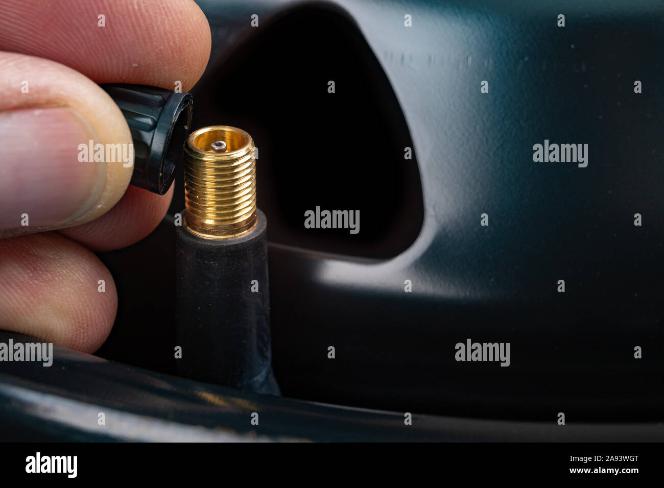 Vent in the wheel of a passenger car. A place to refill air with tires ...
