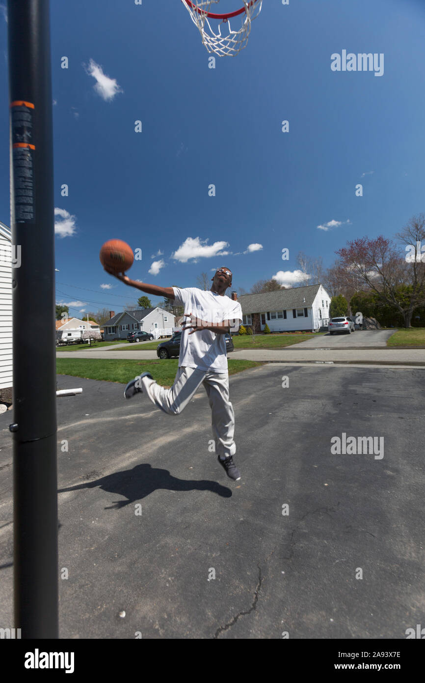 Man with Williams Syndrome playing basketball Stock Photo - Alamy