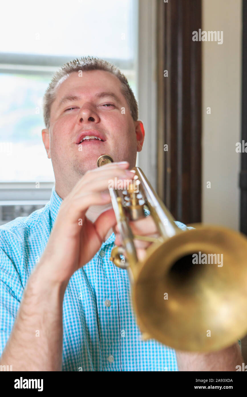 Person playing the trumpet hi-res stock photography and images - Alamy