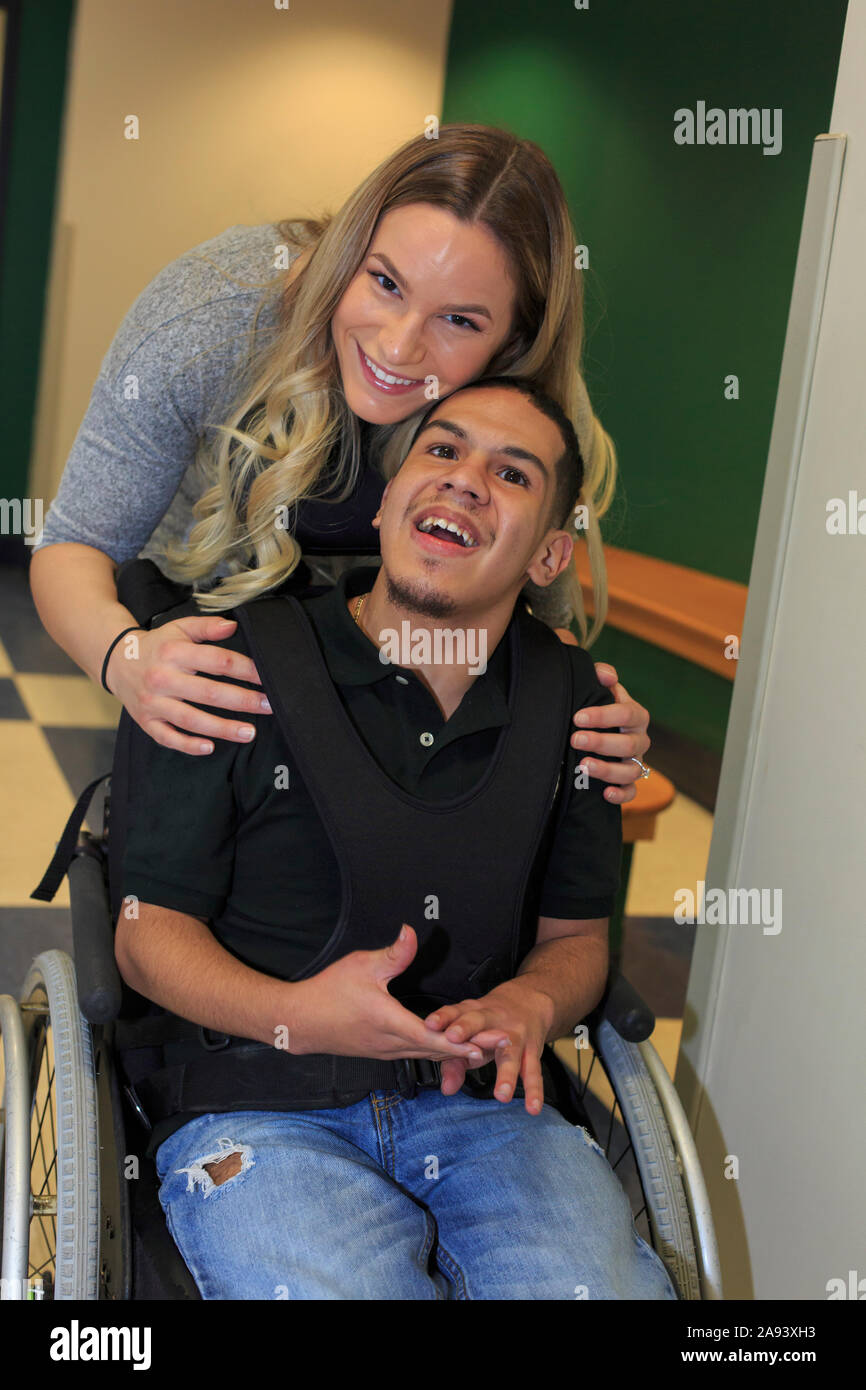 Boy with Spastic Quadriplegic Cerebral Palsy and teacher in the school ...