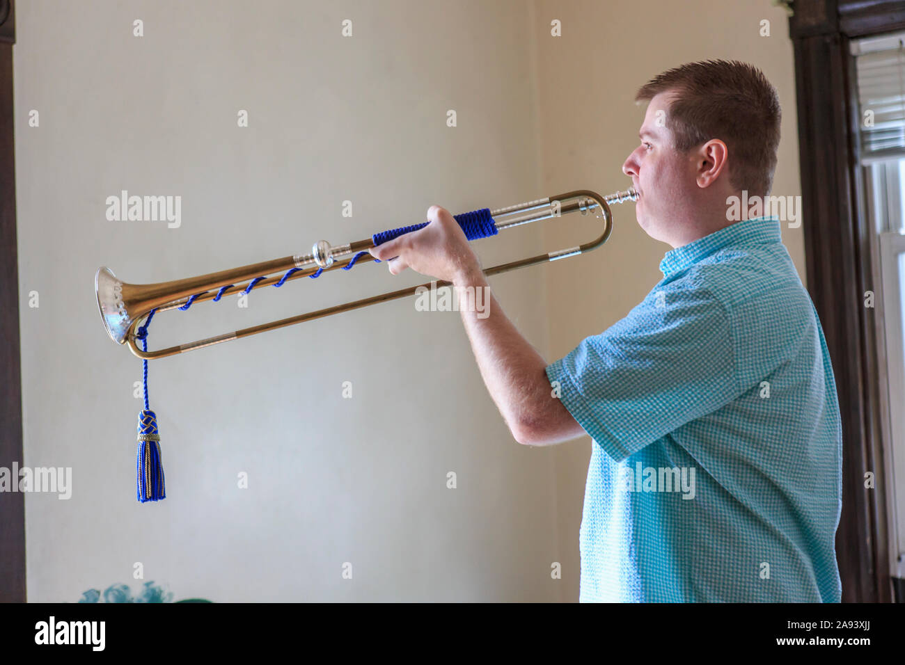 Musician with Visual Impairment playing bugle Stock Photo - Alamy
