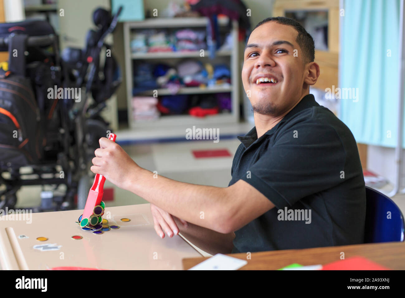 Boy with Spastic Quadriplegic Cerebral Palsy learning at school Stock ...