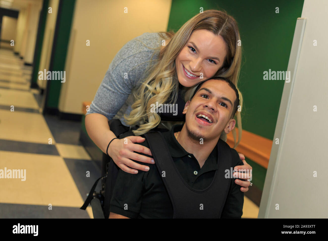 Boy with Spastic Quadriplegic Cerebral Palsy and teacher in the school ...