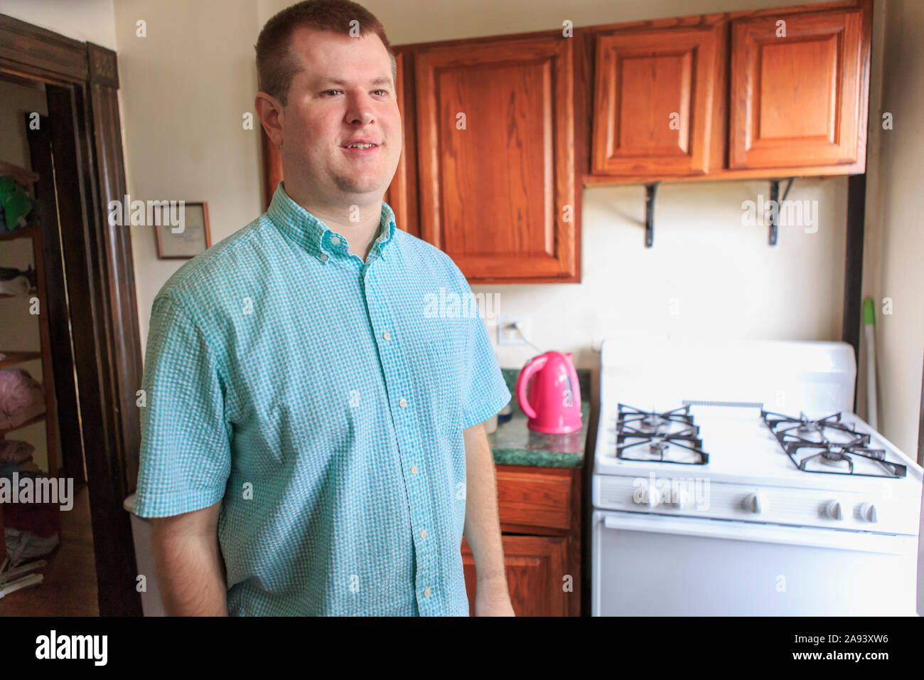 Man standing up at home hi-res stock photography and images - Alamy