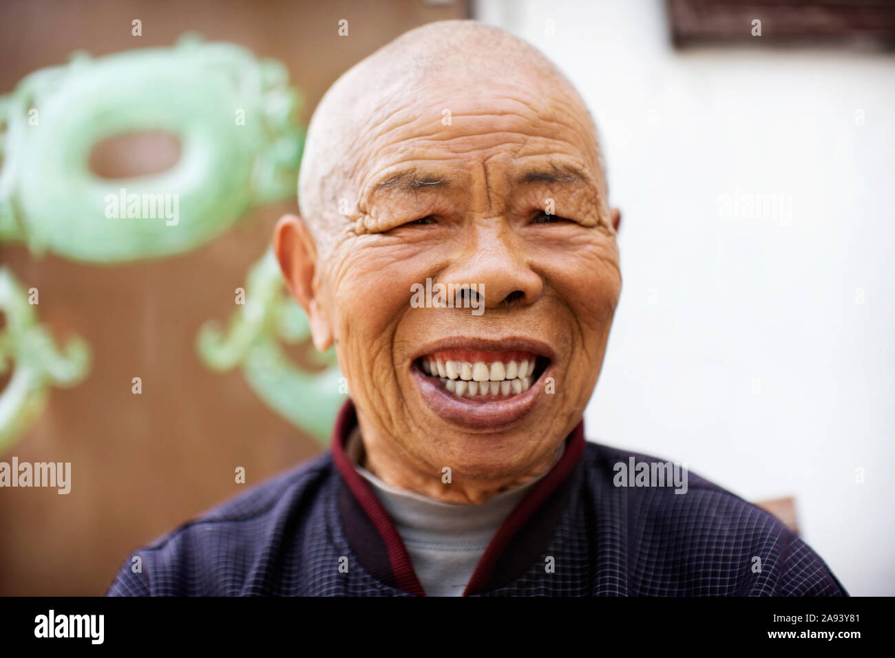 Portrait of a bald smiling senior man Stock Photo - Alamy