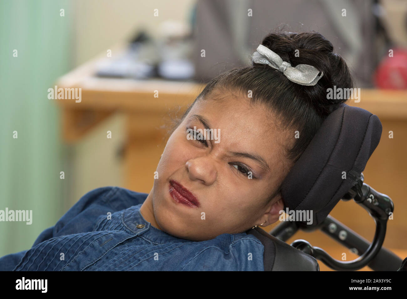 Teen with Spastic Dystonic Cerebral Palsy at school Stock Photo - Alamy