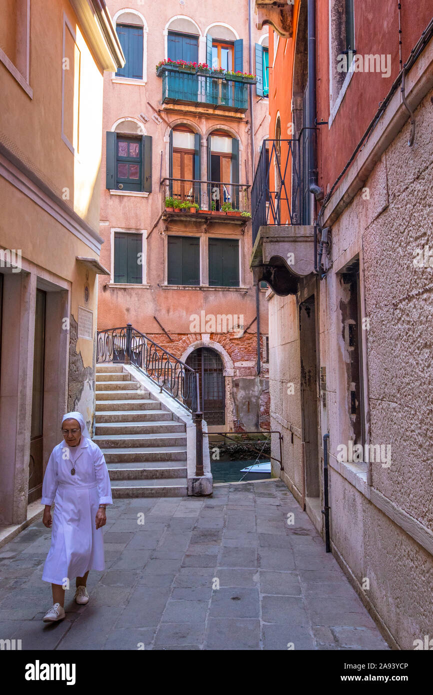 Catholic nun walking in street hi-res stock photography and images - Alamy
