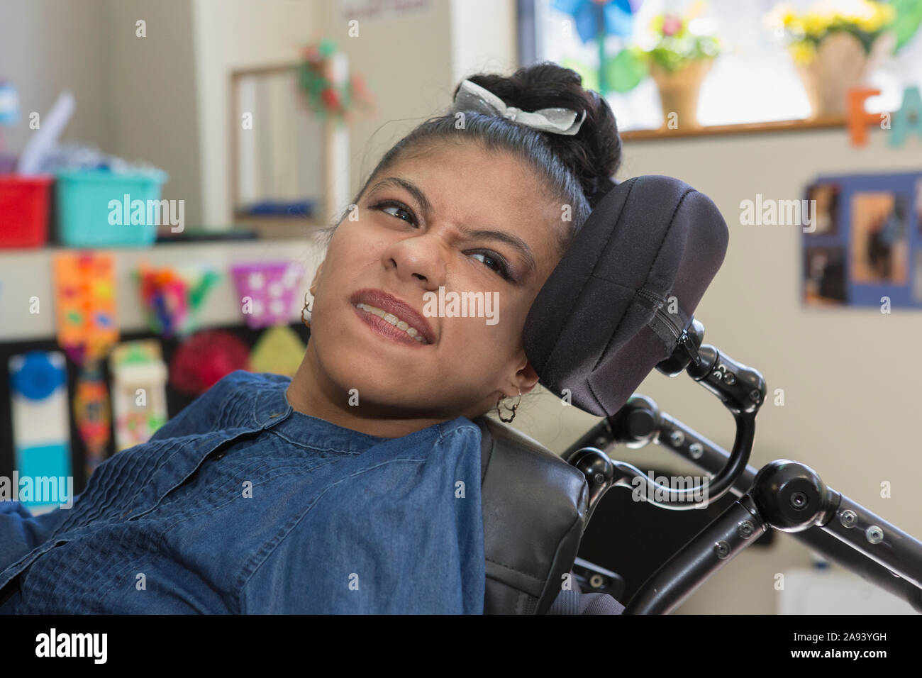 Teen with Spastic Dystonic Cerebral Palsy at school Stock Photo - Alamy