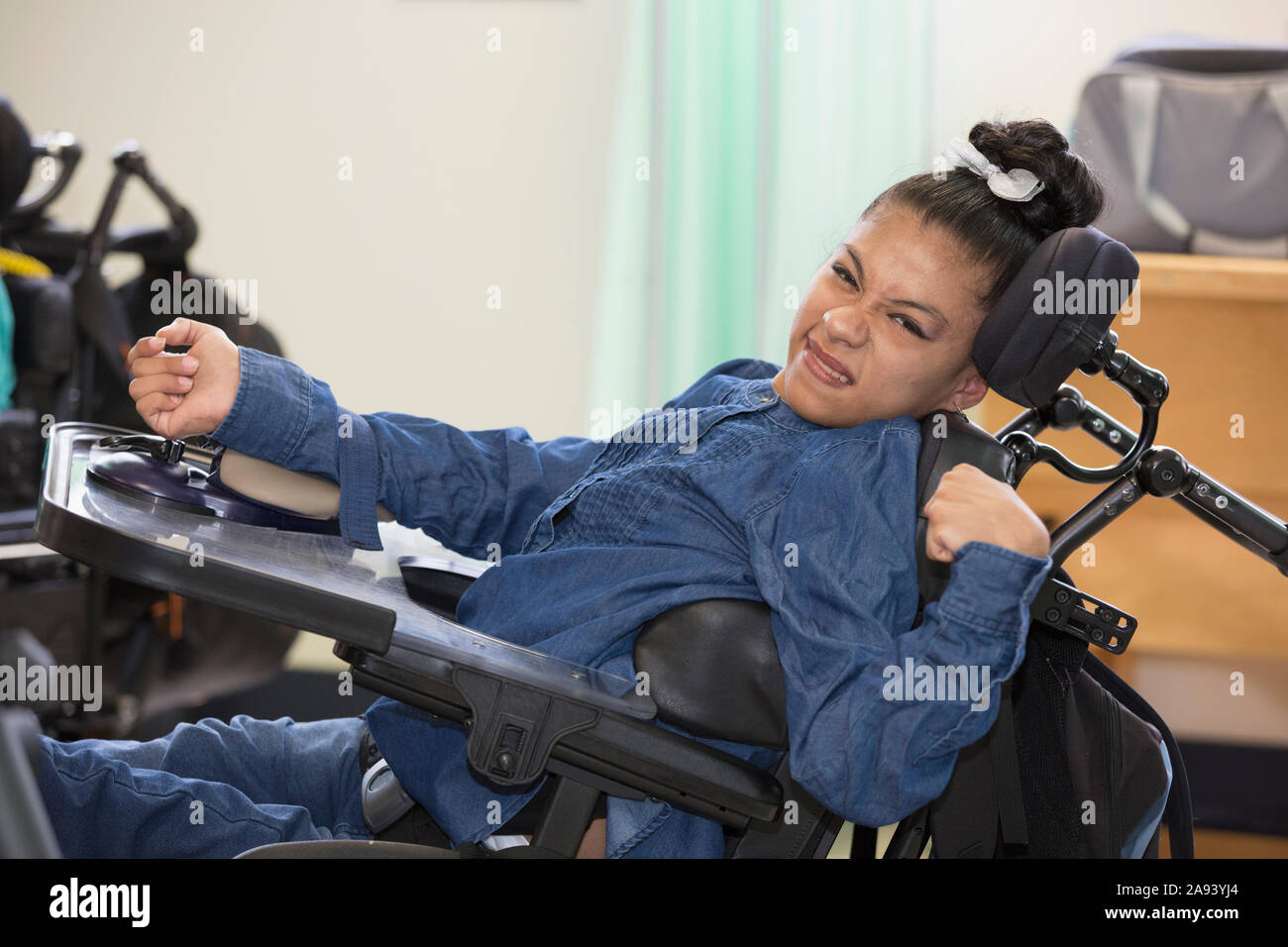 Teen with Spastic Dystonic Cerebral Palsy at school Stock Photo - Alamy
