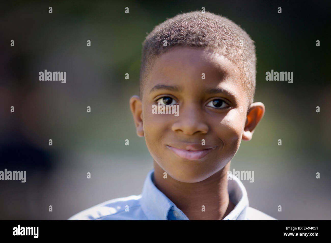 Portrait of a boy smiling Stock Photo - Alamy