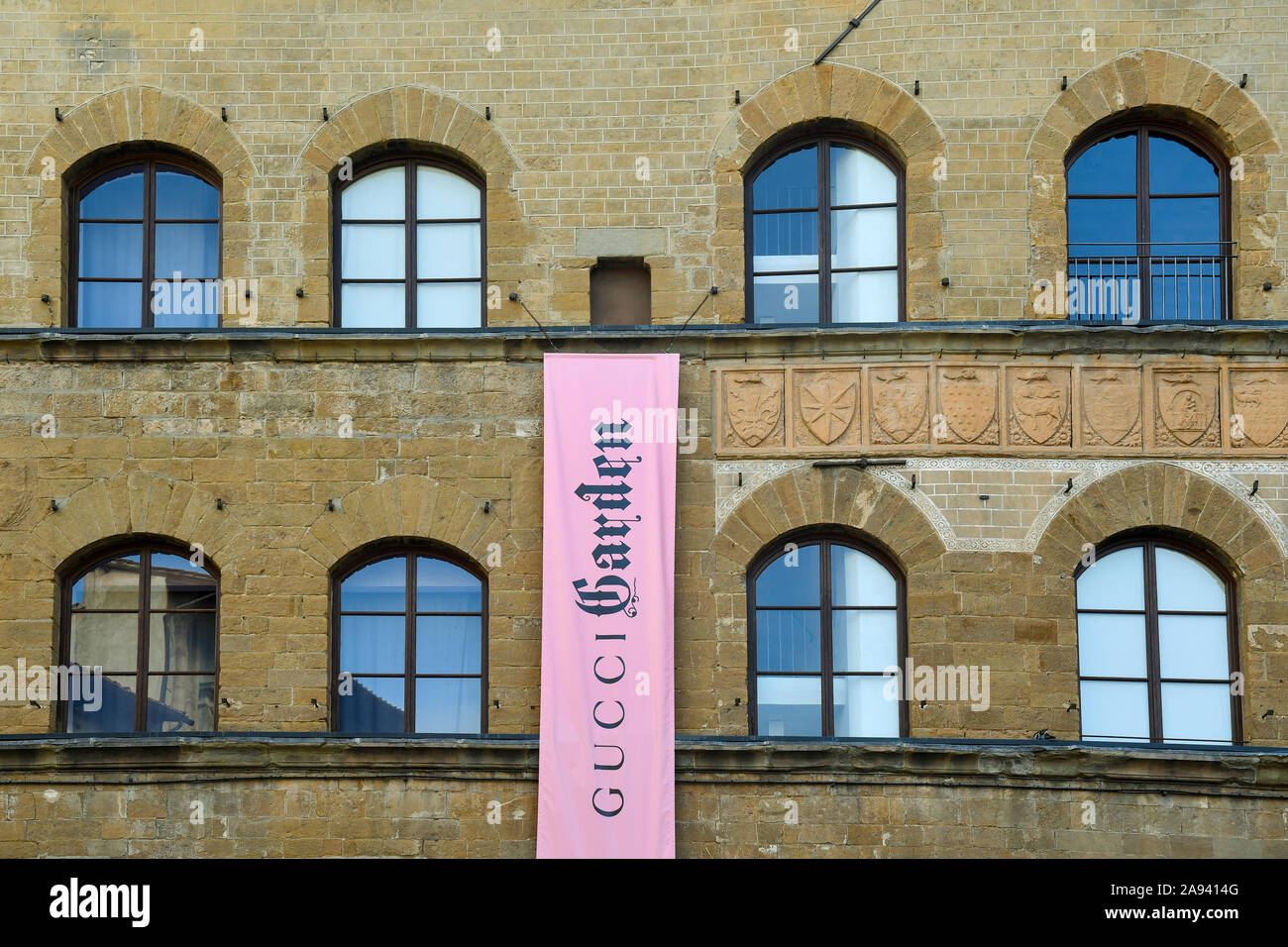 Exterior of Palazzo della Mercanzia in Signoria Square with the banner ...