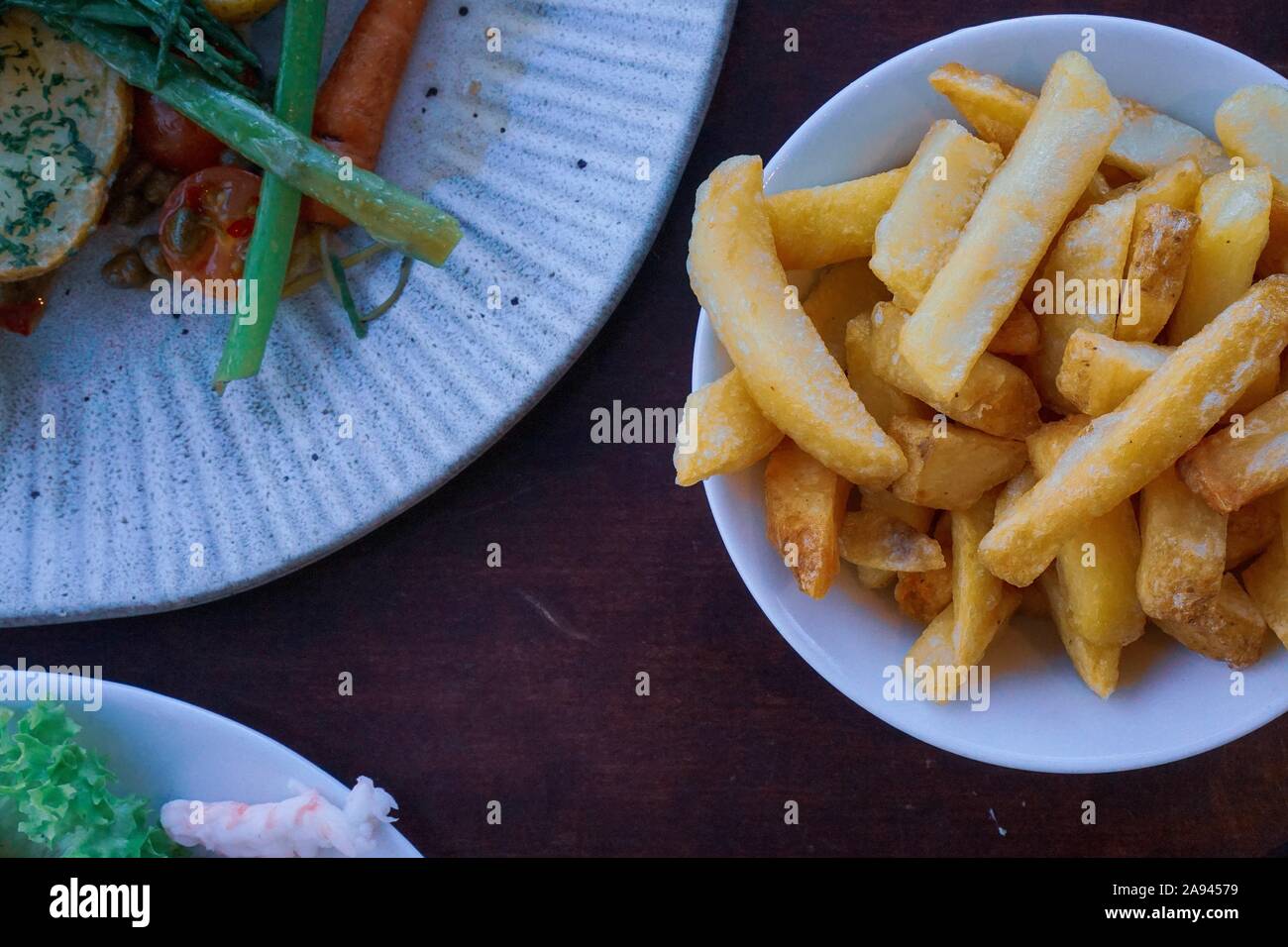 French Fries on the side Stock Photo - Alamy