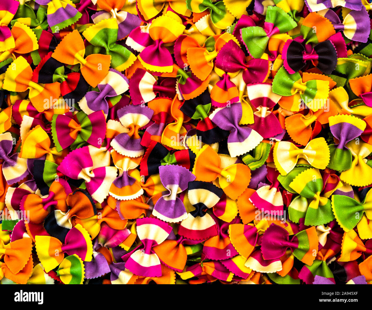 Multi-coloured farfalle pasta Stock Photo - Alamy