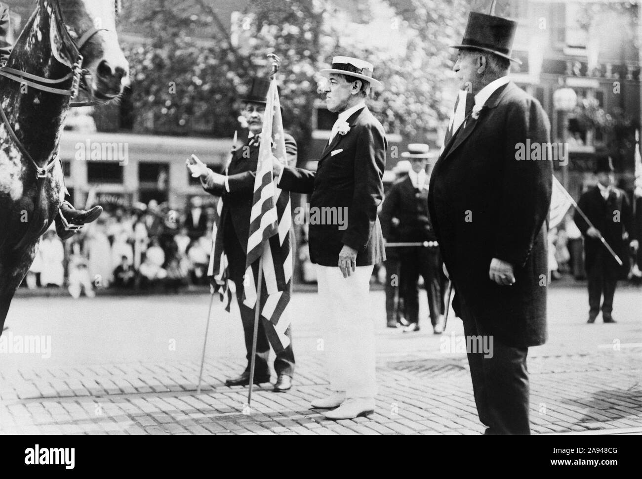 Flag at parade hi-res stock photography and images - Alamy