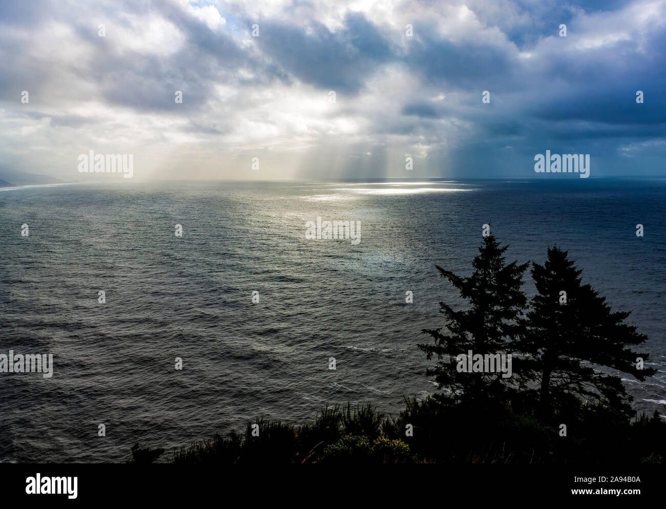 Sun rays shining on the water of the Pacific Ocean, viewed from the ...