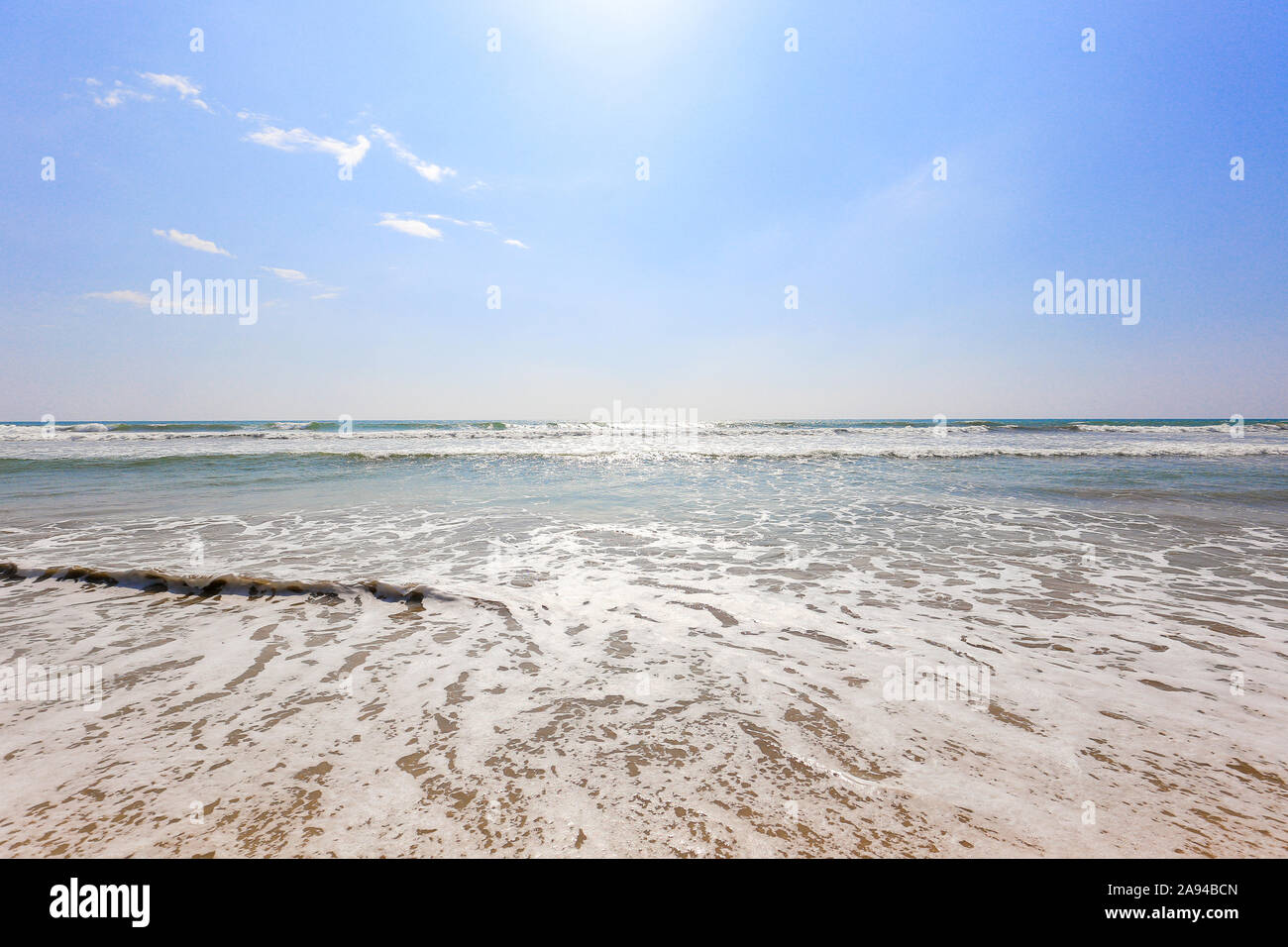 Beach sand waves sun hi-res stock photography and images - Alamy