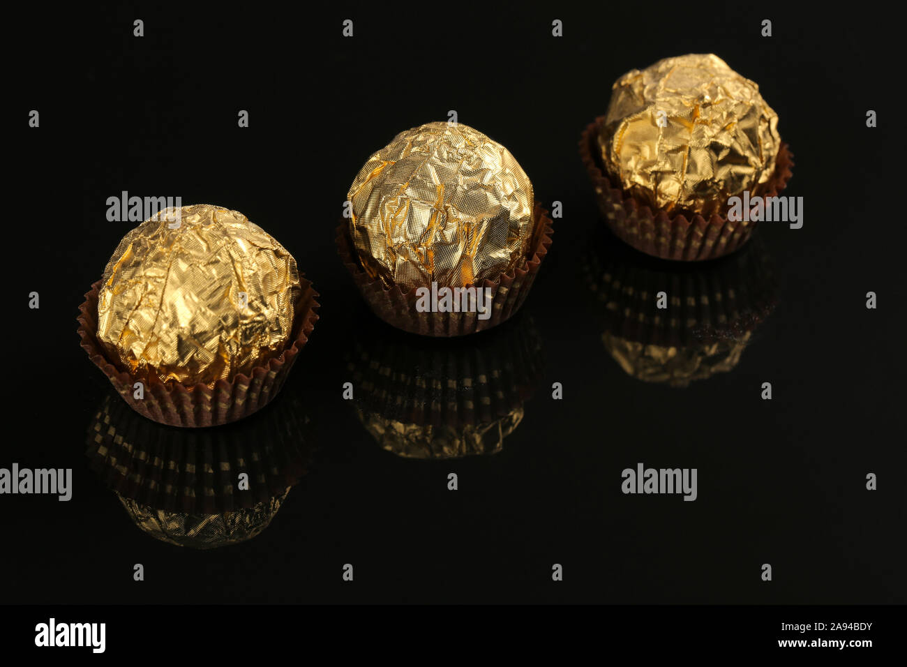 Wrapped caramel candies hi-res stock photography and images - Alamy