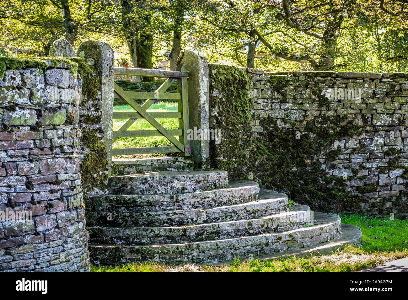 Stone semi-circular steps to a gate leading to a churchyard; Carrshield ...