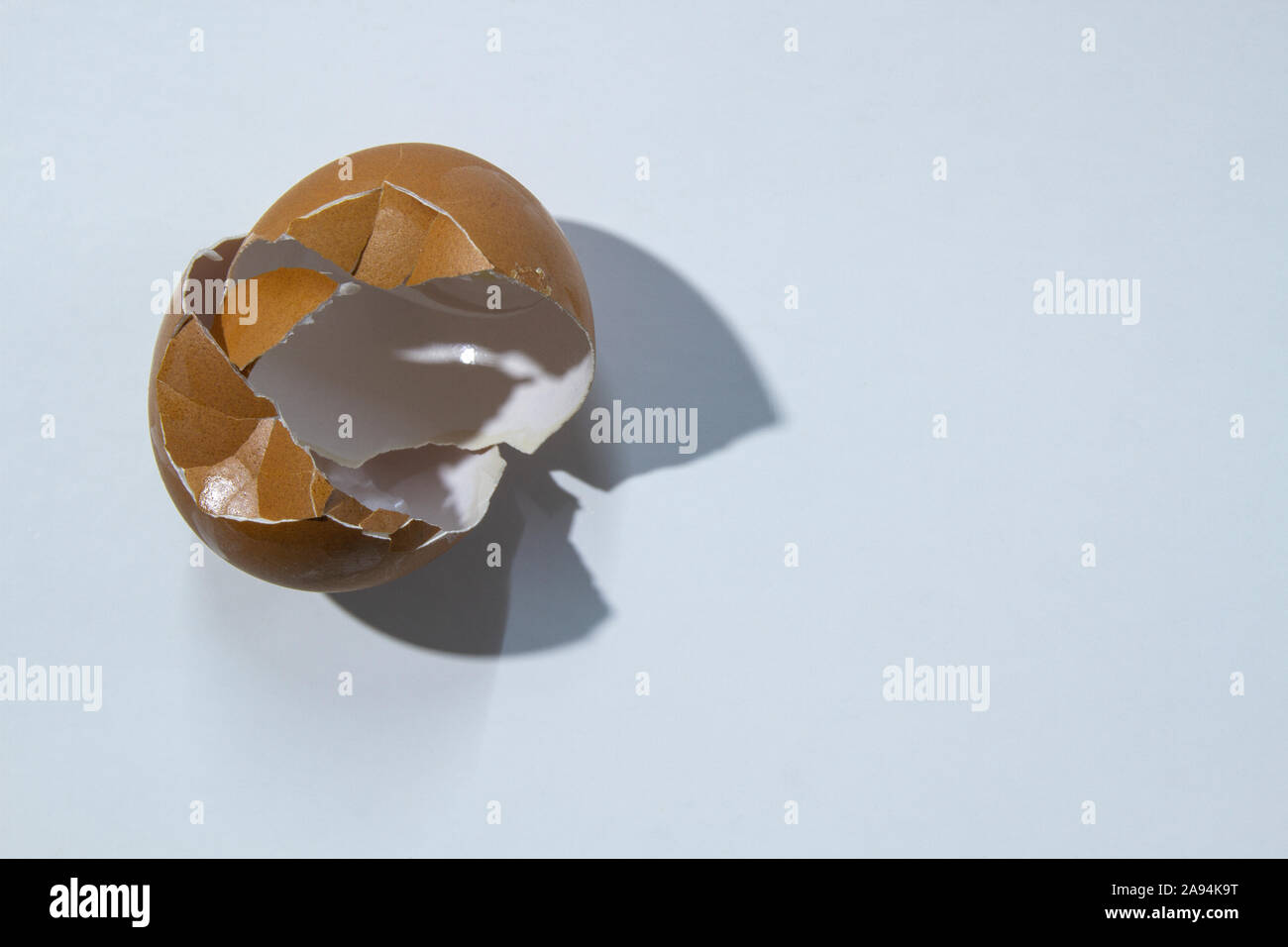Empty broken eggshell on the white background picture Stock Photo - Alamy