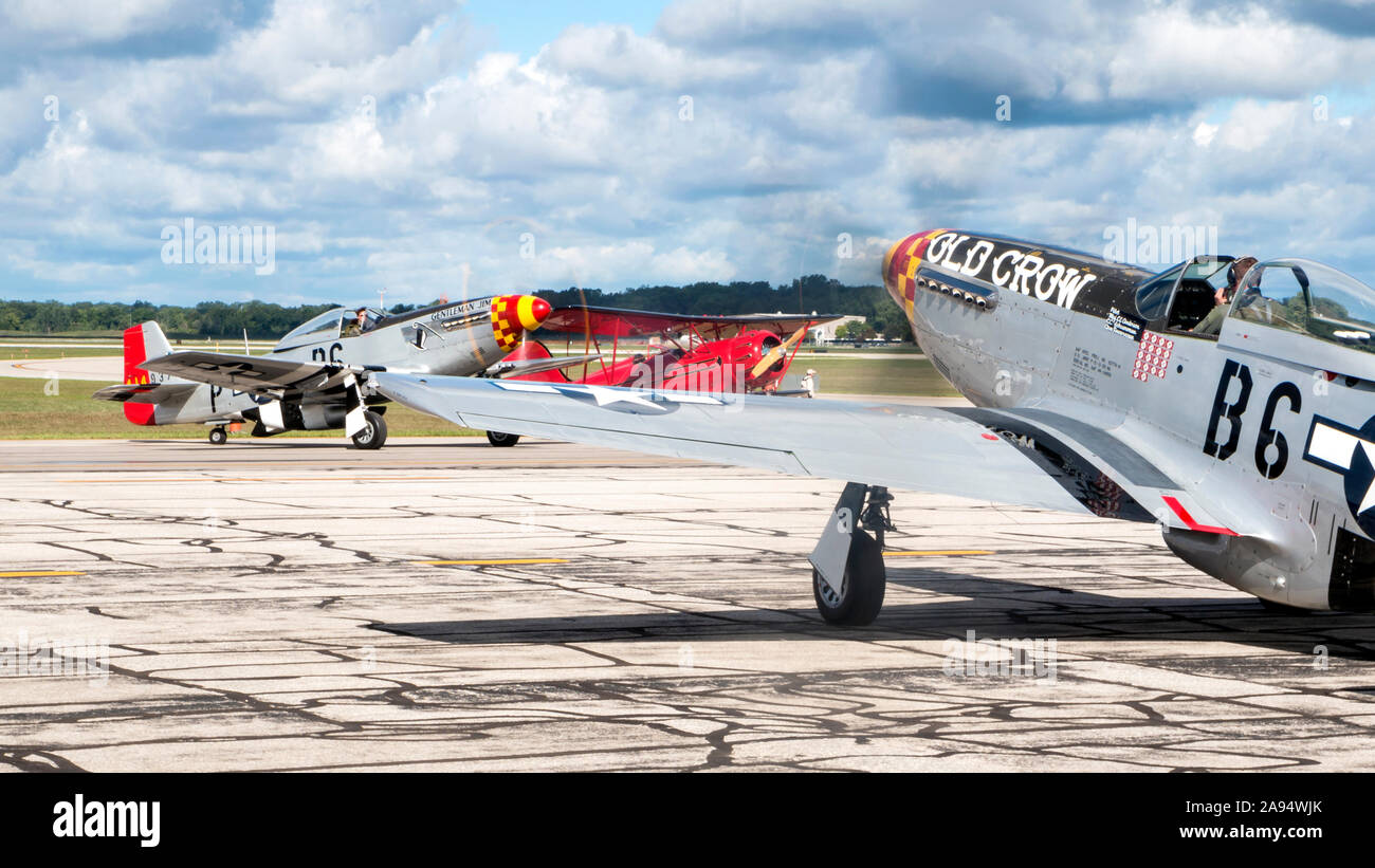 A World War II era P-51 Mustang waits to taxi out for a performance at ...