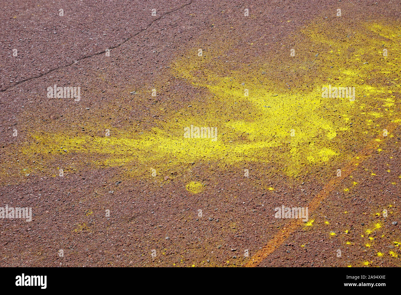 Big and small yellow shapeless spot of bright yellow on grainy brown ...