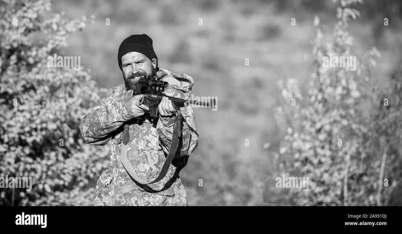 Focus and concentration of experienced hunter. Hunting masculine hobby ...