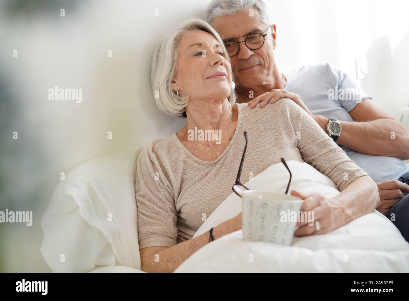Couple older woman in bed hi-res stock photography and images - Alamy