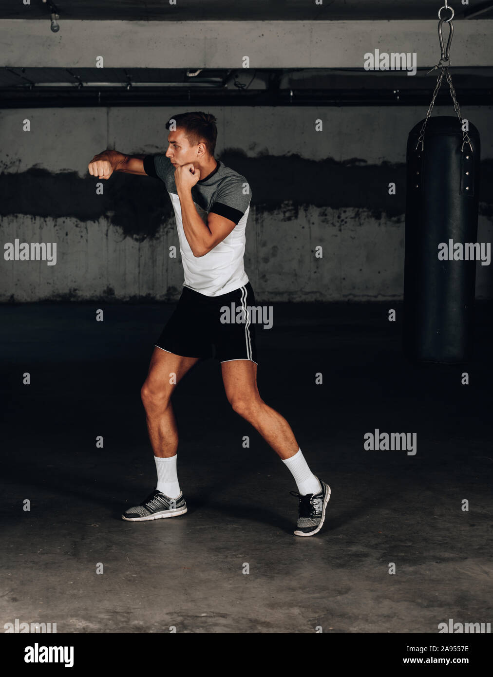 Fighter position while practicing boxing workout Stock Photo - Alamy