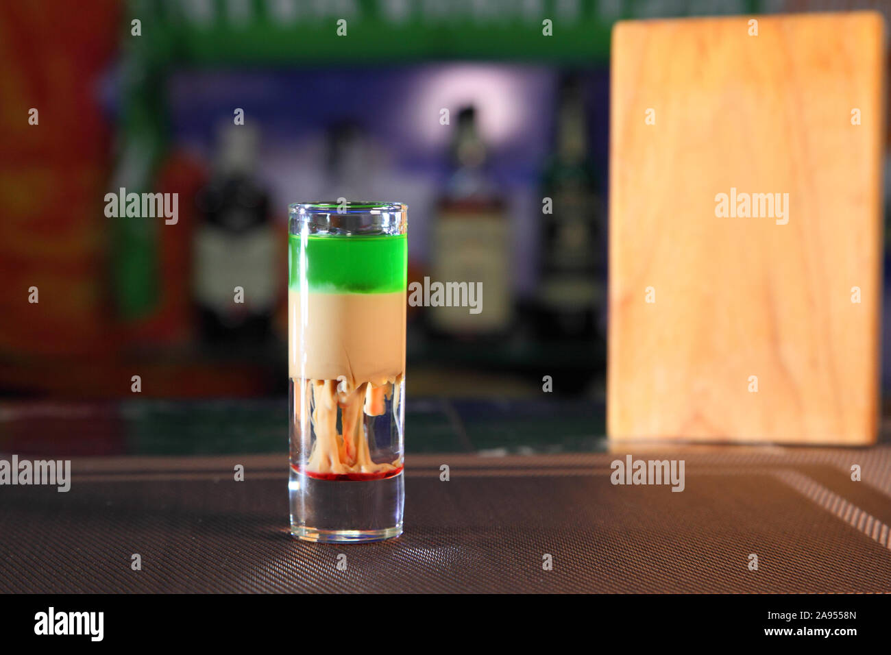 Alcoholic cocktail brain explosion.Shot brain explosion at the bar ...