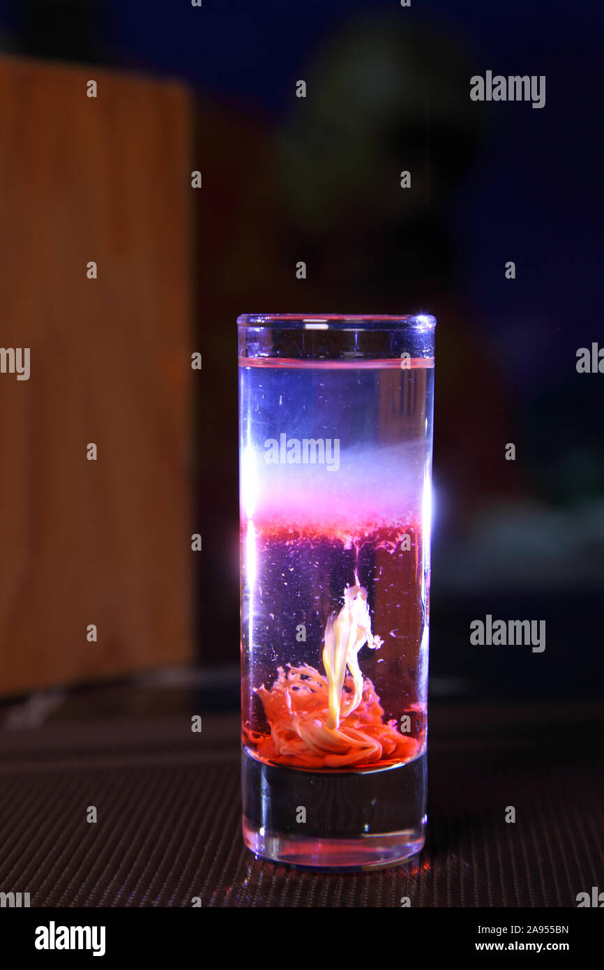 Alcoholic cocktail brain explosion.Shot brain explosion at the bar ...