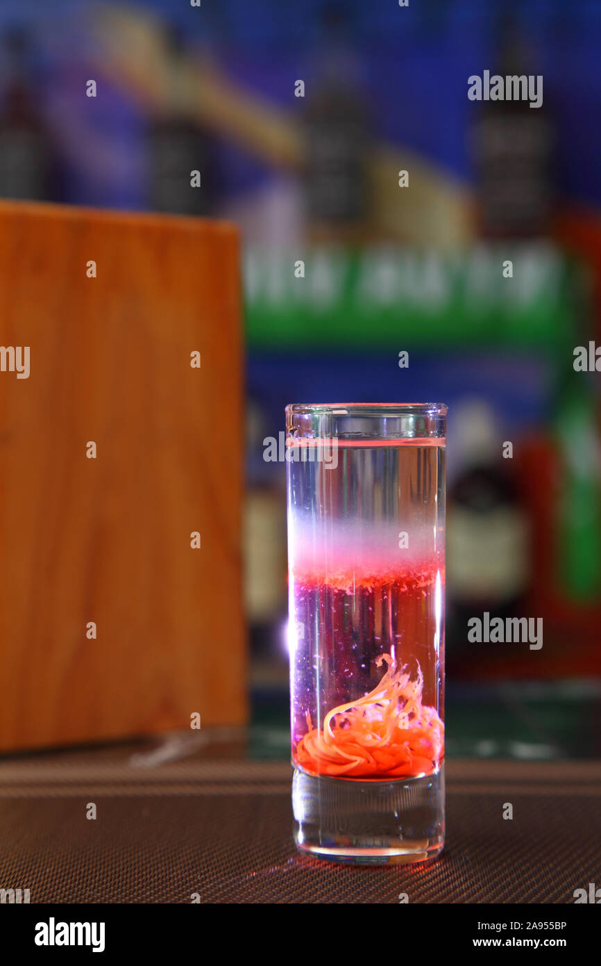 Alcoholic cocktail brain explosion.Shot brain explosion at the bar ...