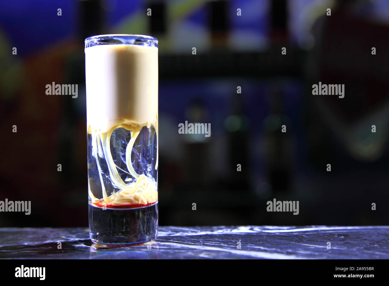 Alcoholic cocktail brain explosion.Shot brain explosion at the bar ...