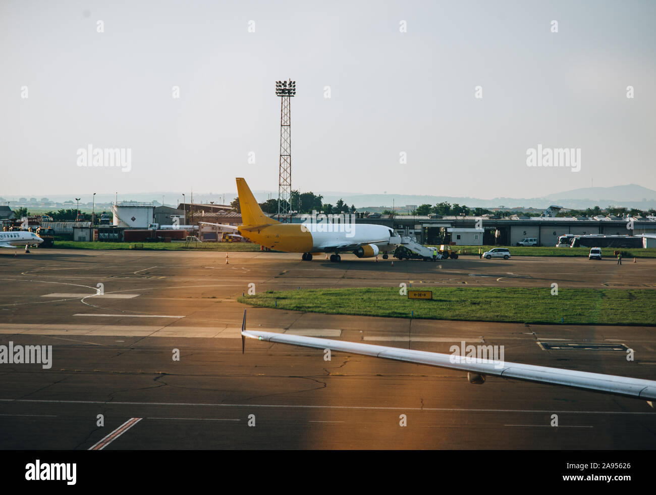Cargo being loaded on a plane for international shipping Stock Photo ...