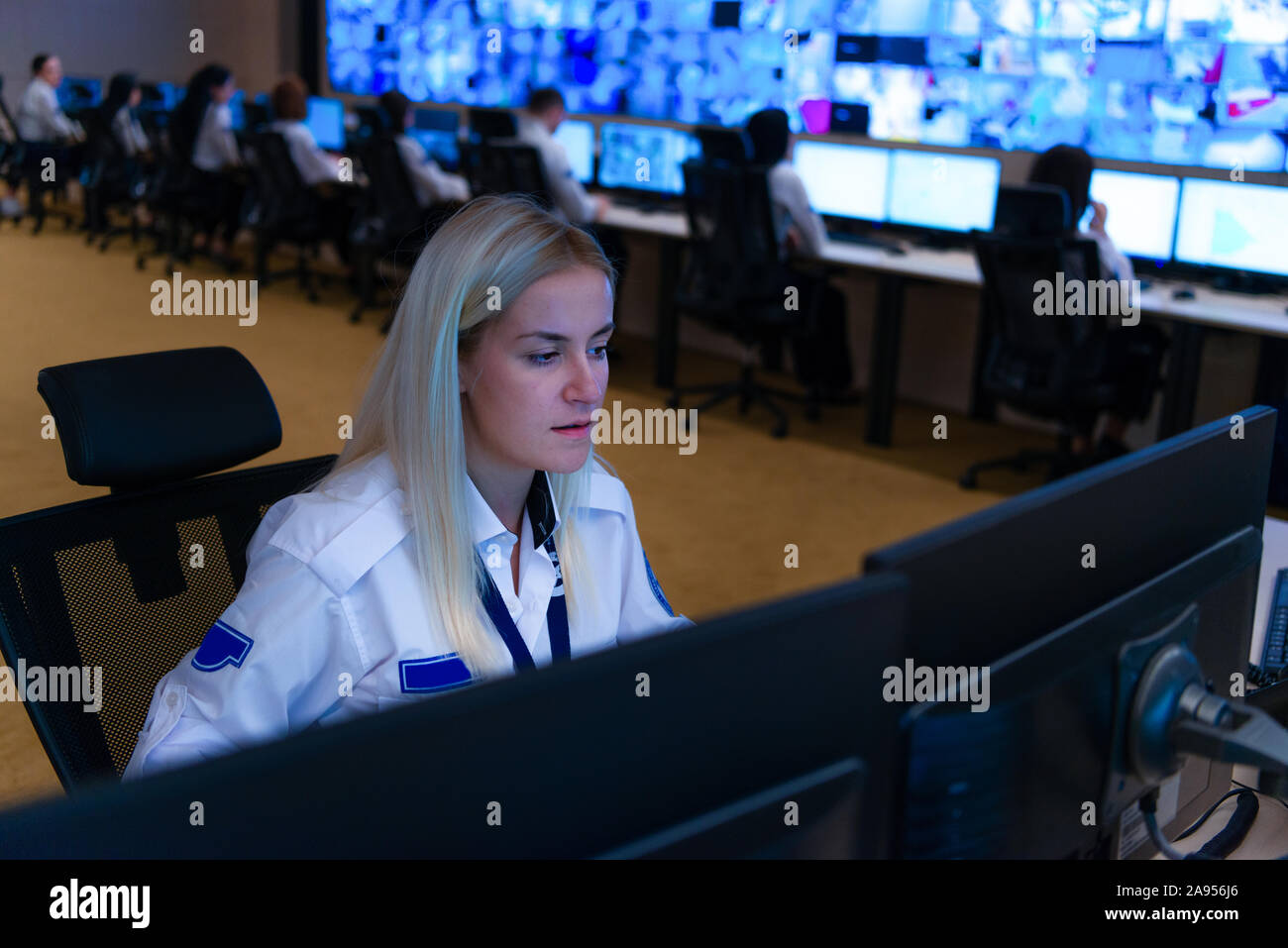 In the System Control Room, Technical Operator Works at His Workstation ...