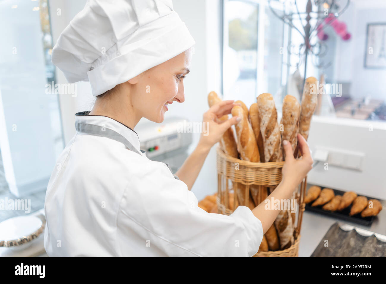 Woman bread basket hi-res stock photography and images - Alamy
