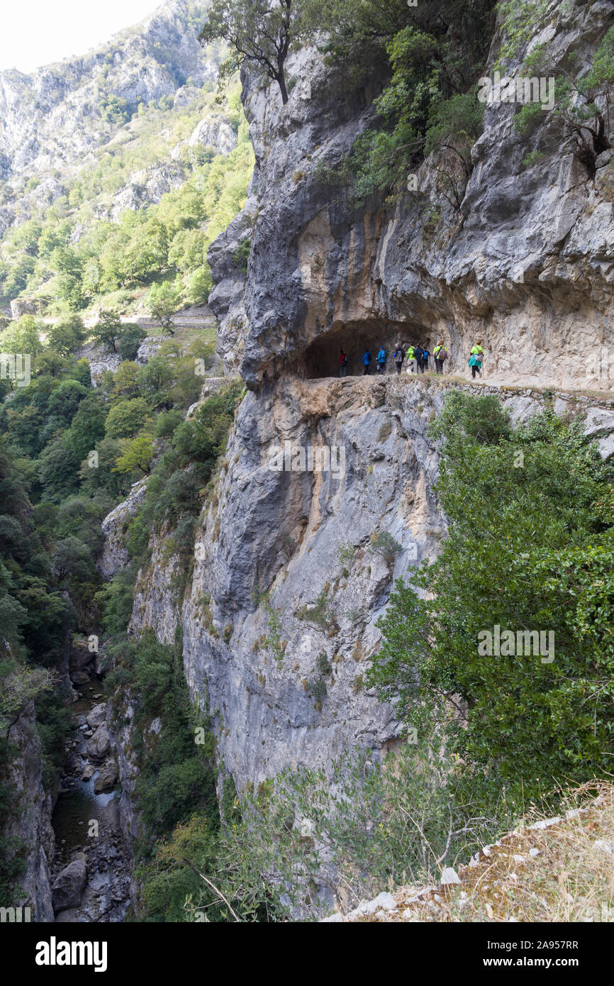 Hikers in the mountains of Cares river pathway, north of Spain Stock ...