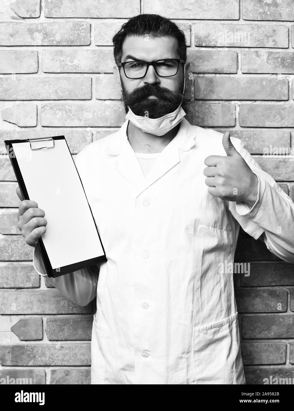 Bearded man, long beard. Brutal caucasian doctor or unshaven hipster ...