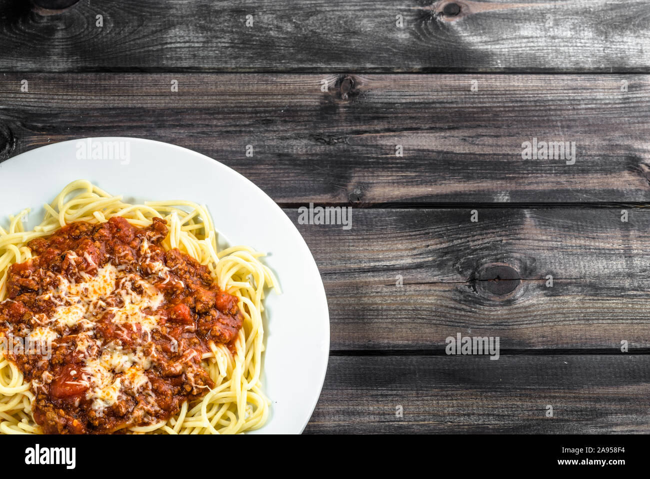 Italian food - Cooked spaghetti bolognese on white plate Stock Photo ...