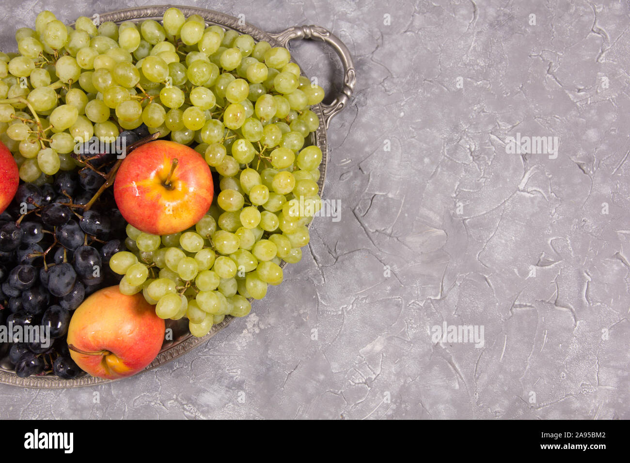 Fresh ripe fruits lie on an old tray Stock Photo - Alamy