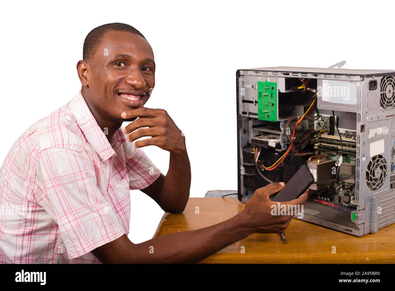 Fixing computer african hi-res stock photography and images - Alamy