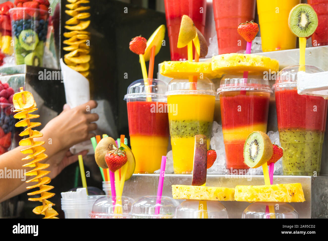 Cold fruit juice on ice in a market. Drinks Stock Photo - Alamy
